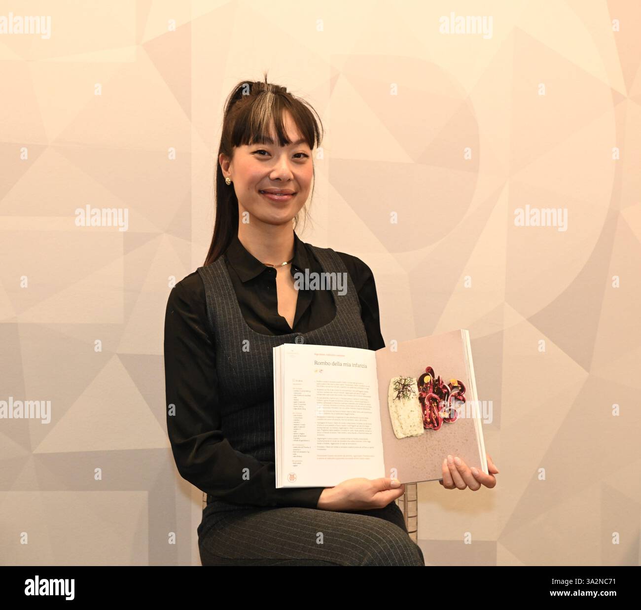 Milan, Italy. 13th Mar, 2025. Milan, Italy Anna Yi Lan Zhang winner of ...