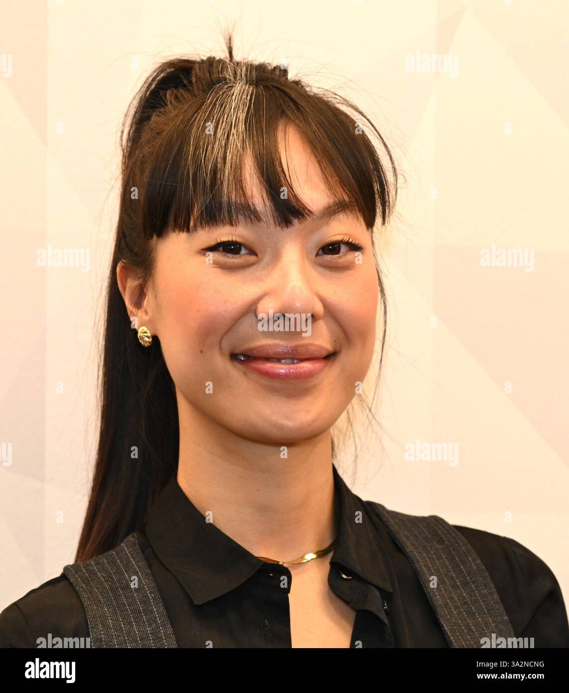 Milan, Italy. 13th Mar, 2025. Milan, Italy Anna Yi Lan Zhang winner of ...