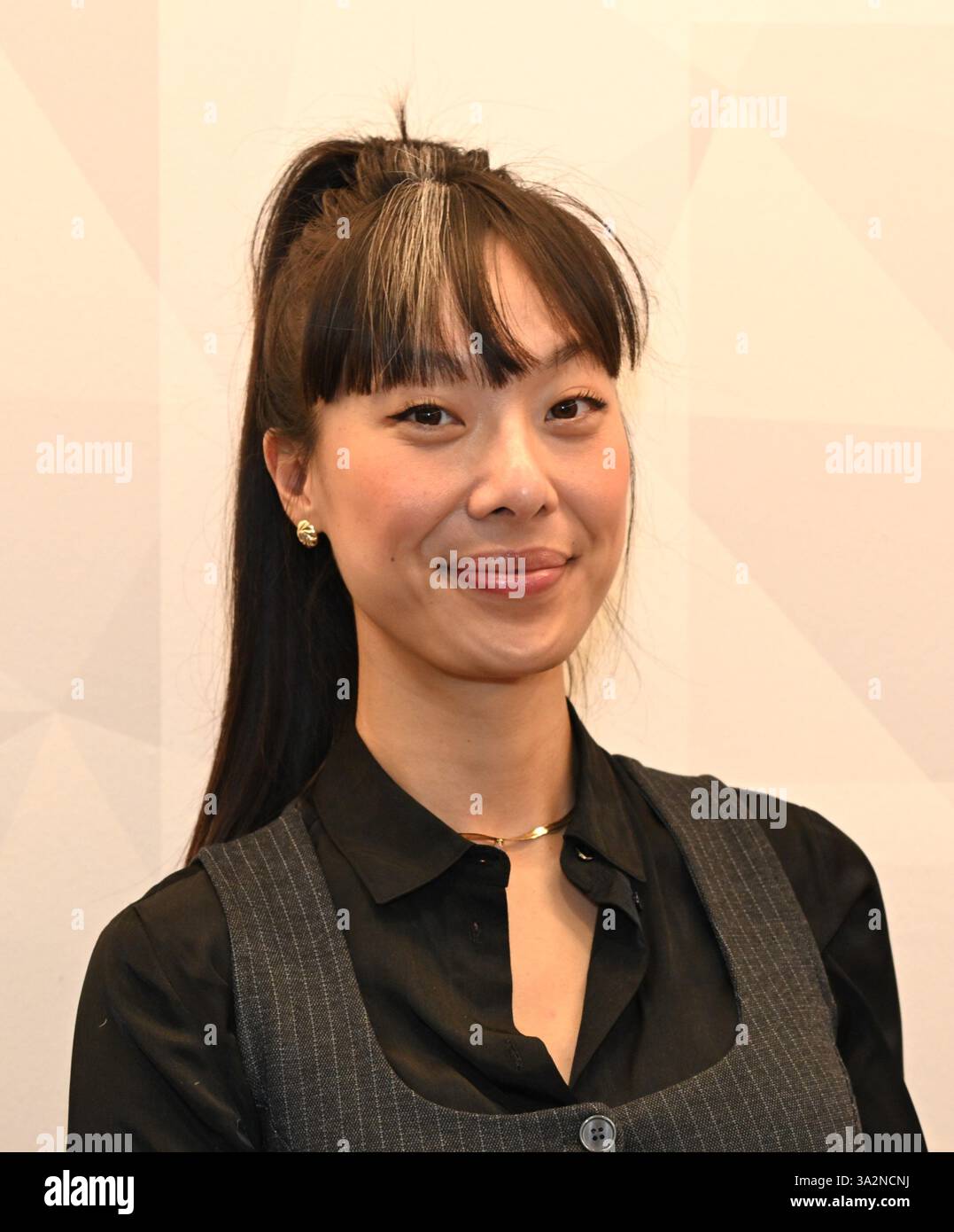 Milan, Italy. 13th Mar, 2025. Milan, Italy Anna Yi Lan Zhang winner of ...