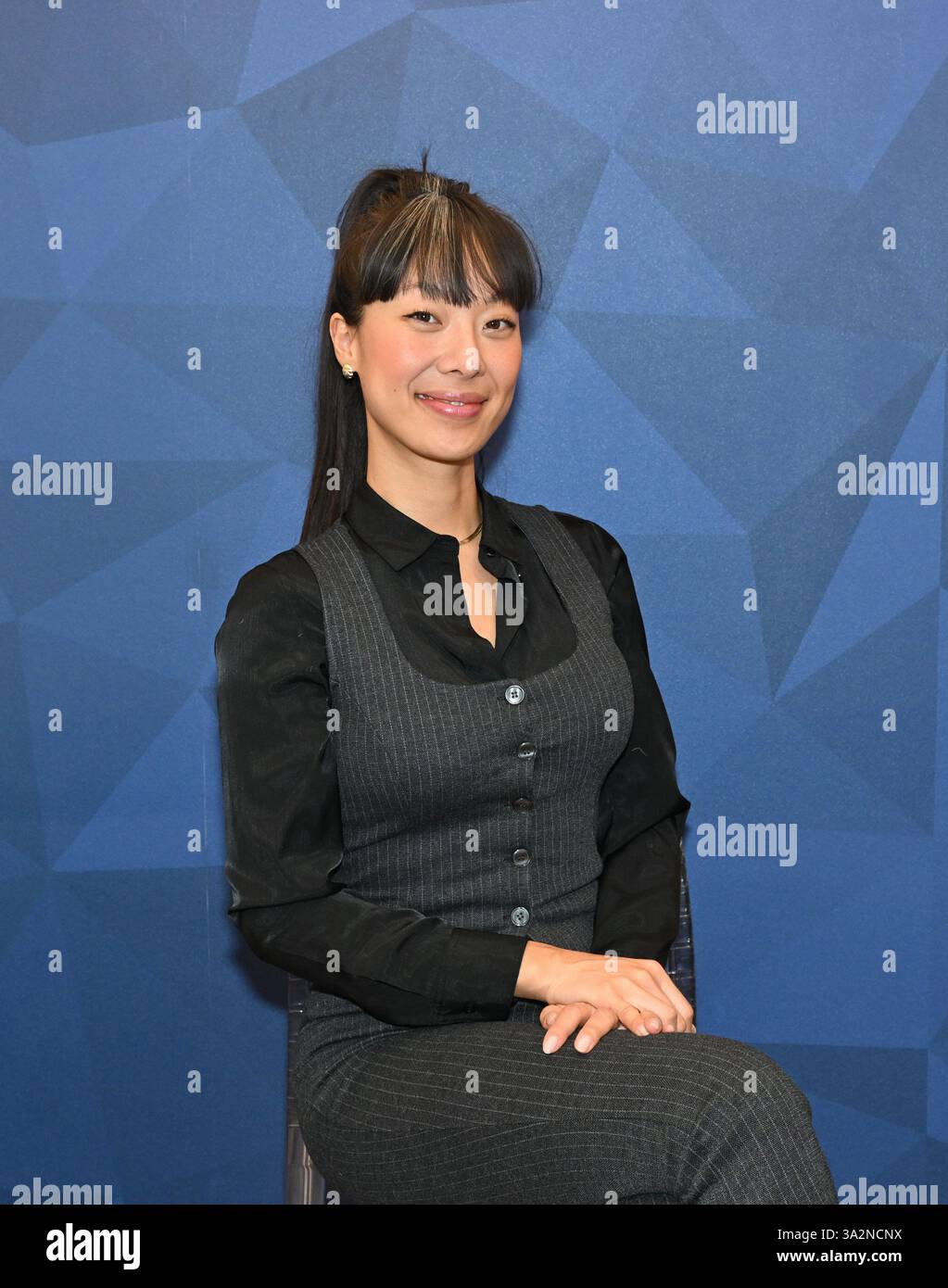 Milan, Italy. 13th Mar, 2025. Milan, Italy Anna Yi Lan Zhang winner of ...