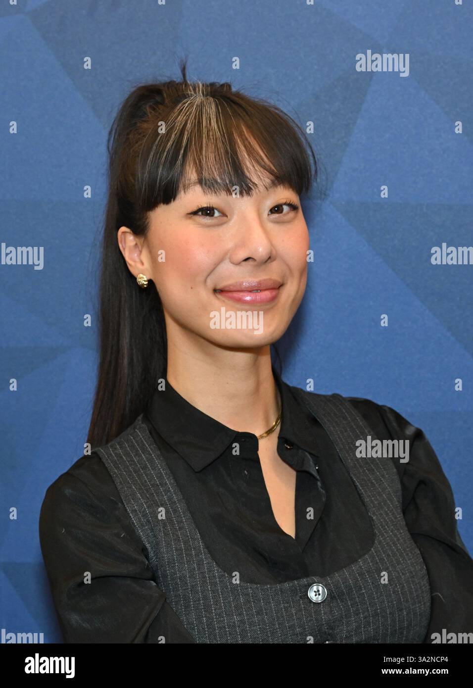 Milan, Italy. 13th Mar, 2025. Milan, Italy Anna Yi Lan Zhang winner of ...