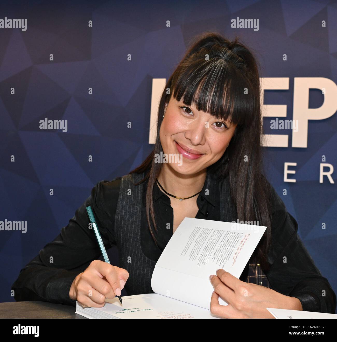 Milan, Italy. 13th Mar, 2025. Milan, Italy Anna Yi Lan Zhang winner of ...