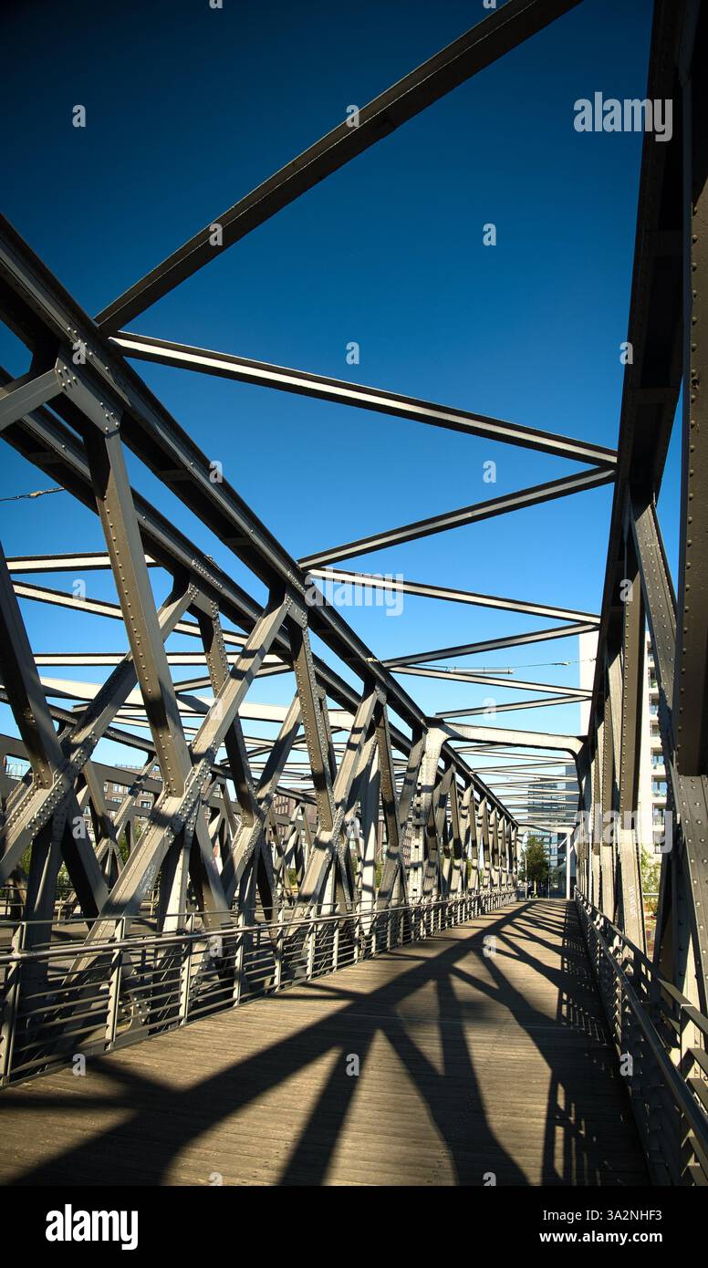 The structure of an old iron bridge with detailed metal beams and ...
