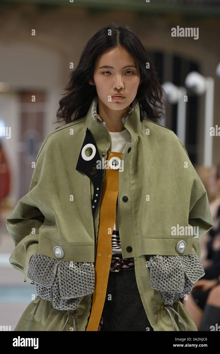 Model Song Ah Woo walks on the runway during the Louis Vuitton Ready to ...