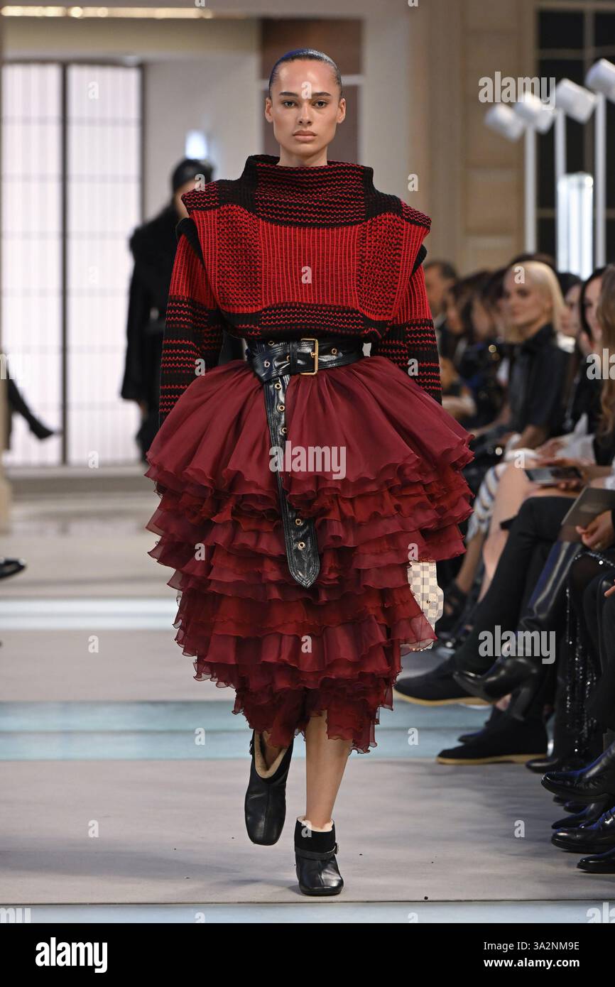 Model Annemary Aderibigbe walks on the runway during the Louis Vuitton ...