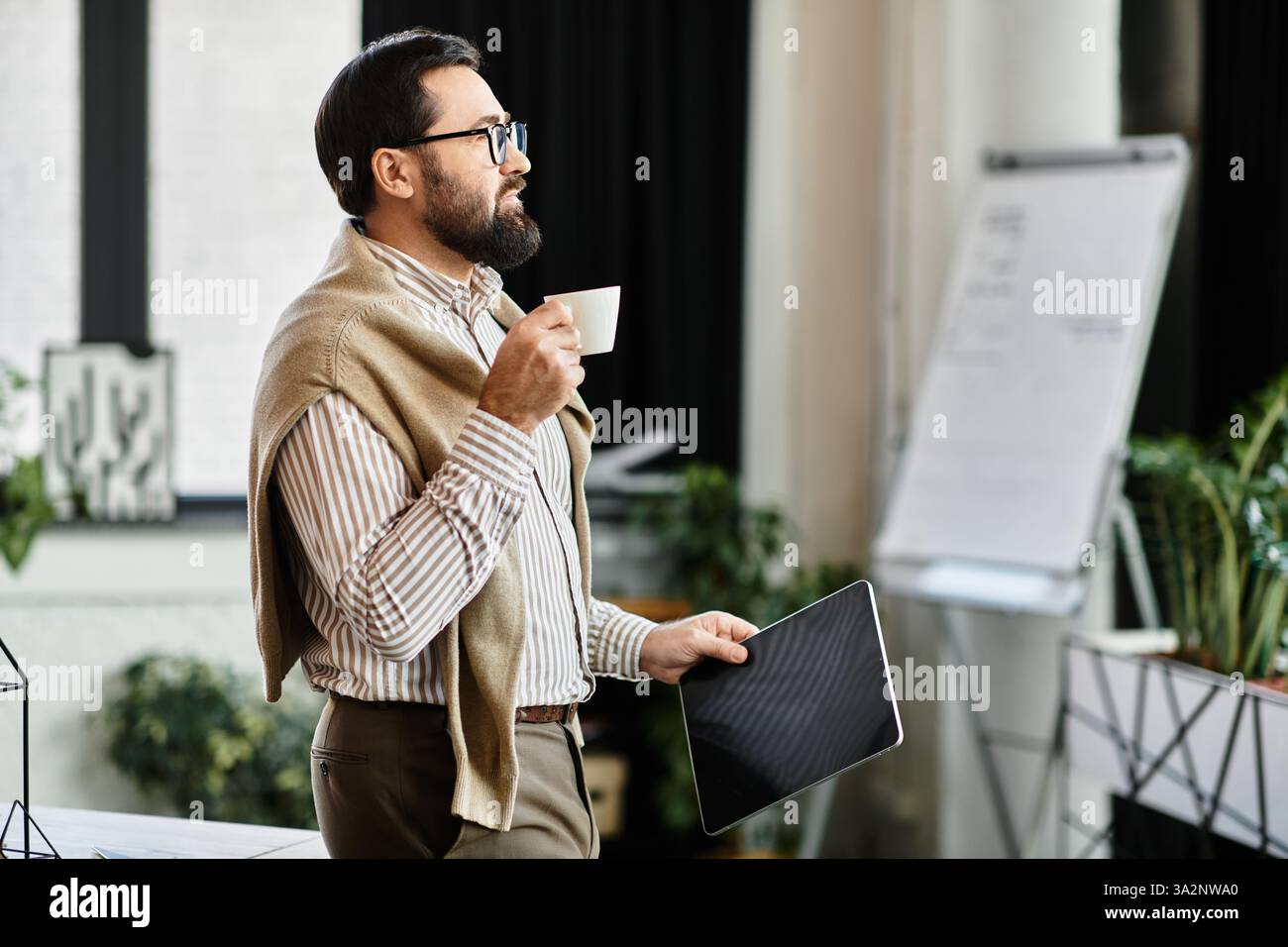 A distinguished elderly man savors a cup of coffee, looking ...