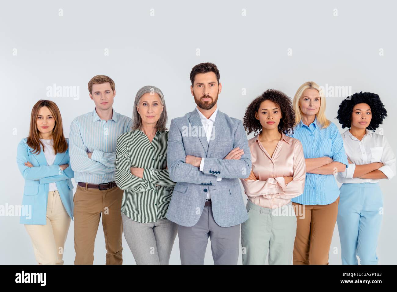 Confident group of diverse professionals standing together in formal ...