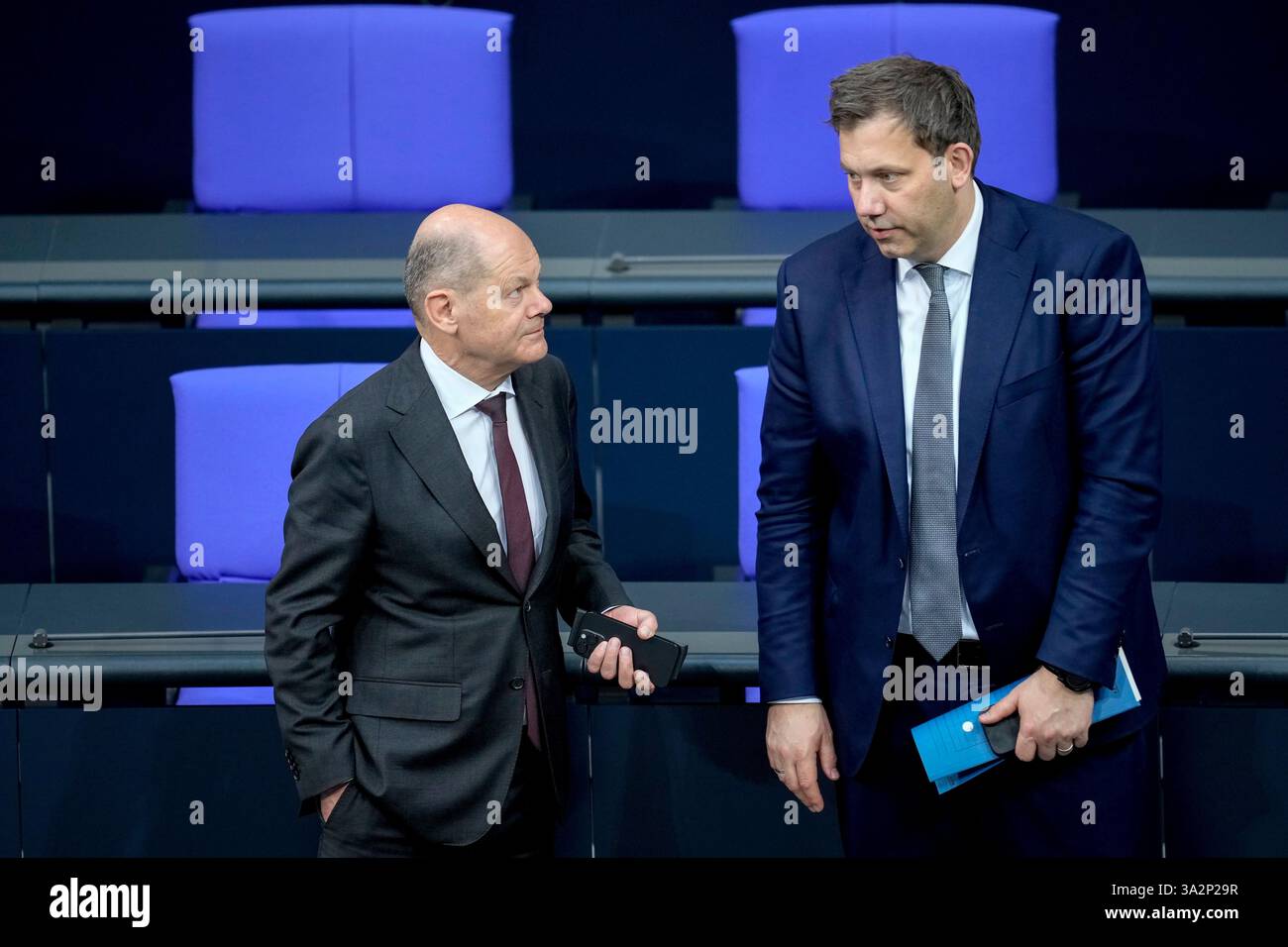 German Chancellor Olaf Scholz, left, and Social Democratic Party leader ...