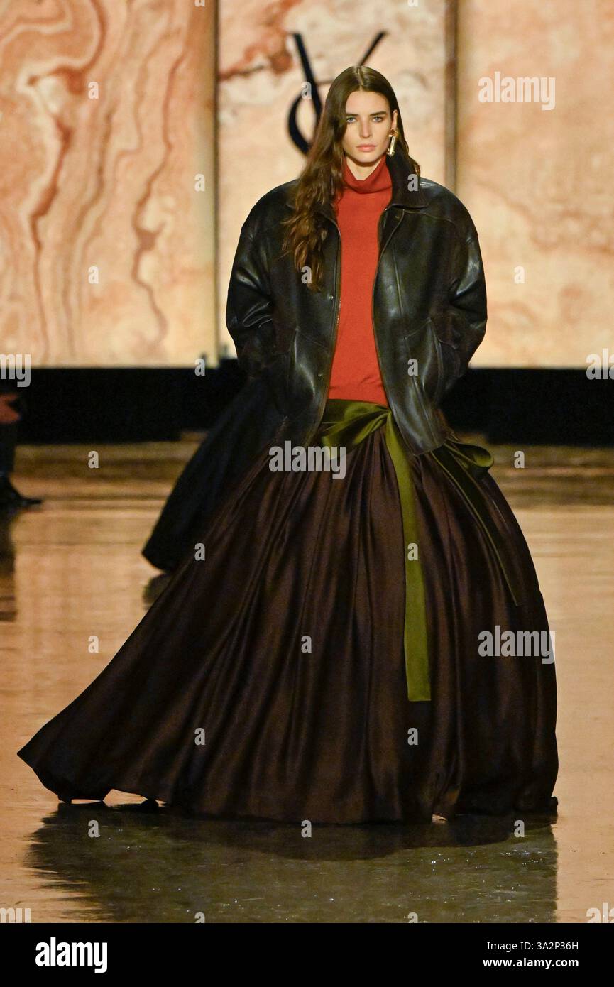 Model Libby Taverner walks on the runway during the Saint Laurent Ready ...