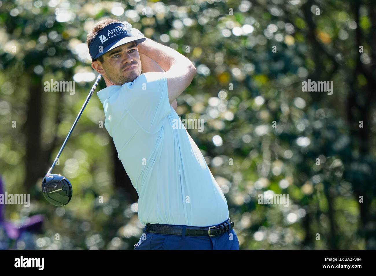 Beau Hossler watches his tee shot on the 15th hole during the first ...