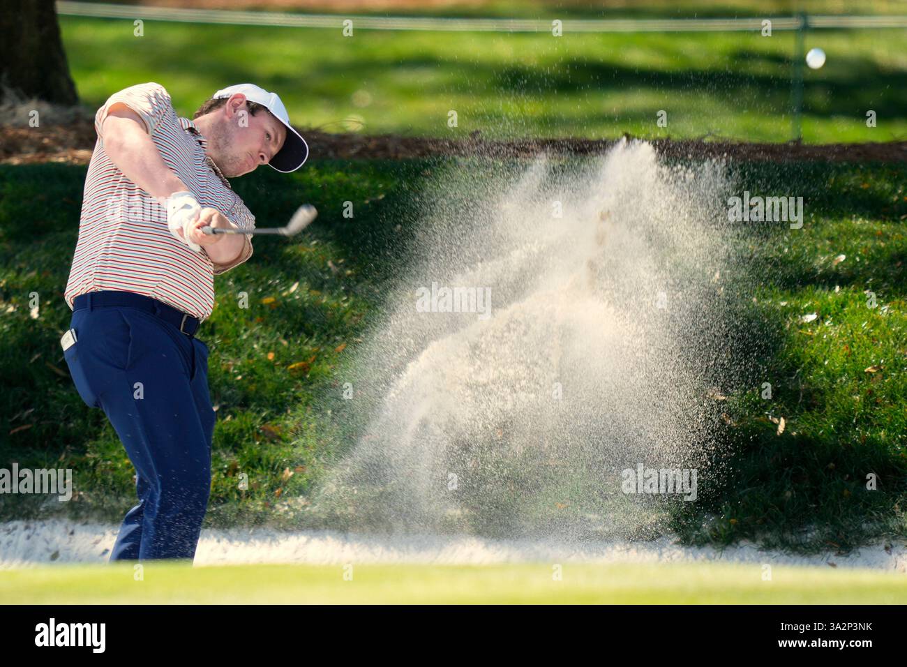 Robert MacIntyre hits out of a bunker on the ninth hole during the first round of The Players ...