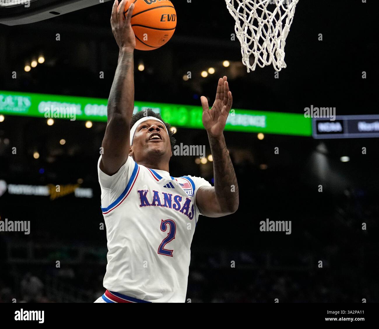 MAR 12 2025: Kansas Jayhawks guard AJ Storr (2) scores 2 of his 19 ...