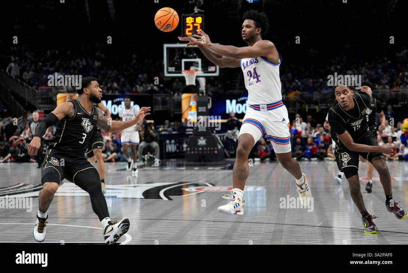 MAR 12 2025: Kansas Jayhawks forward KJ Adams Jr. (24) makes a cross ...