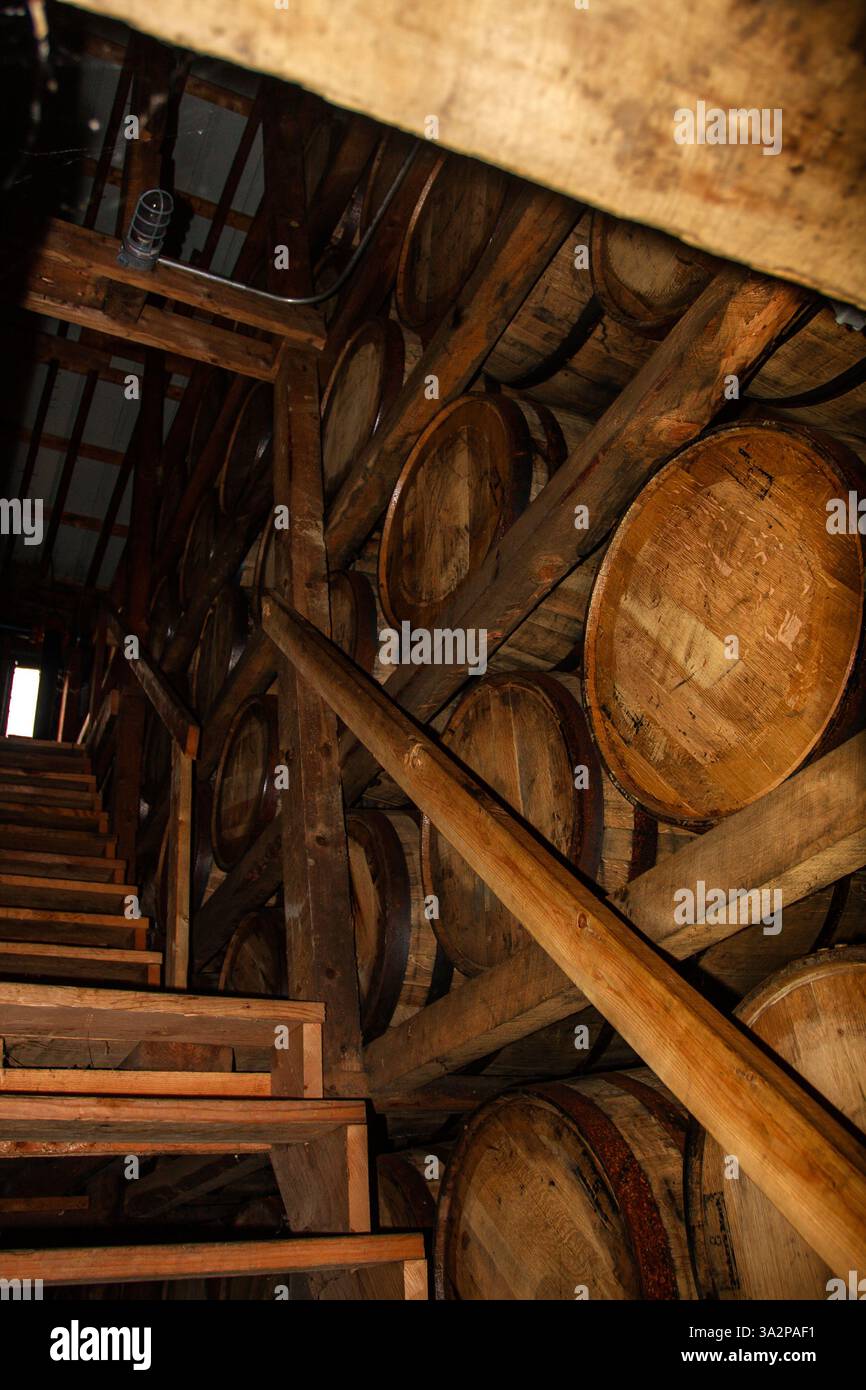 A unique perspective of a rustic wooden warehouse, featuring stacked ...