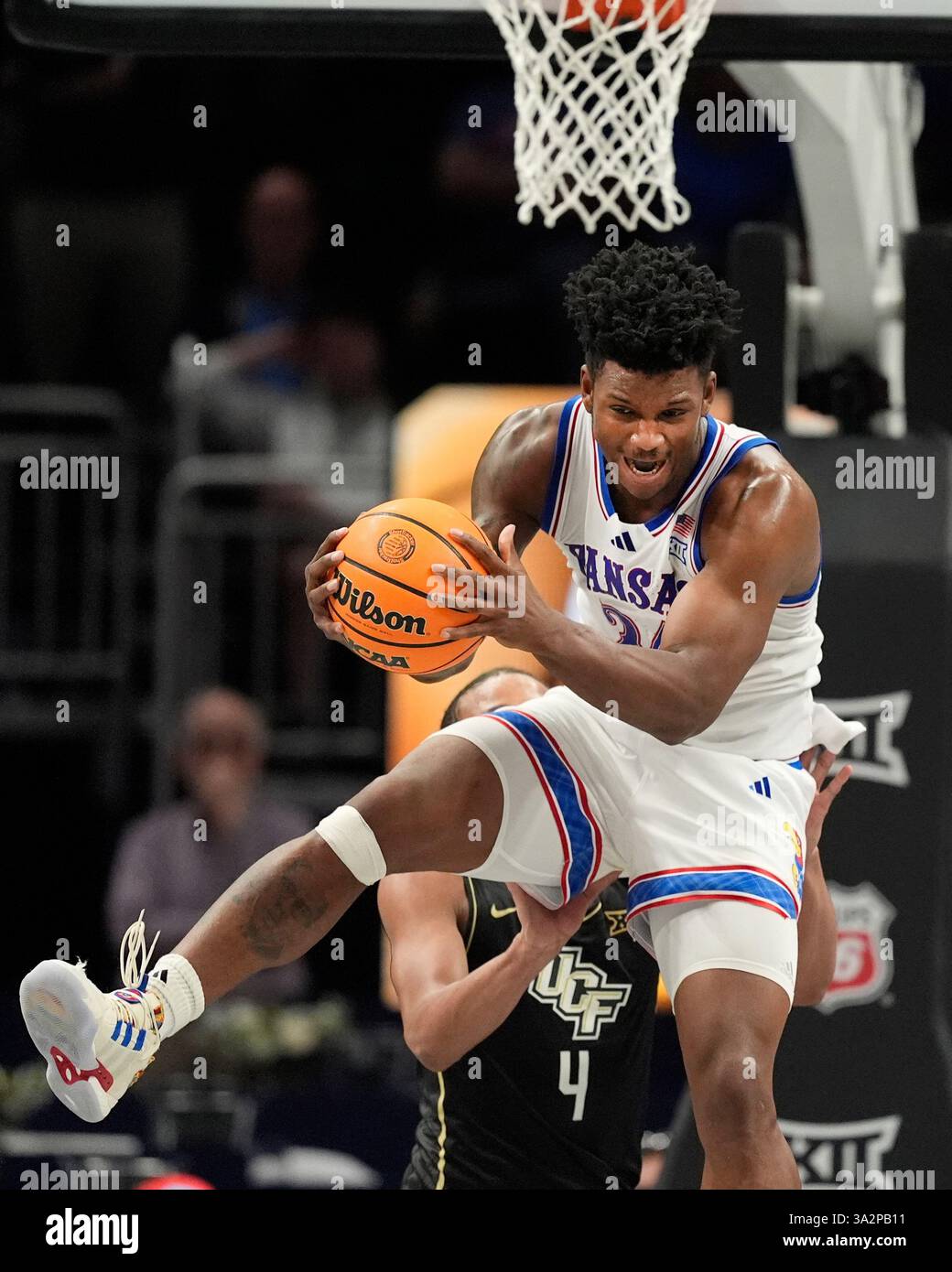 MAR 12 2025: Kansas Jayhawks forward KJ Adams Jr. (24) brings down a ...