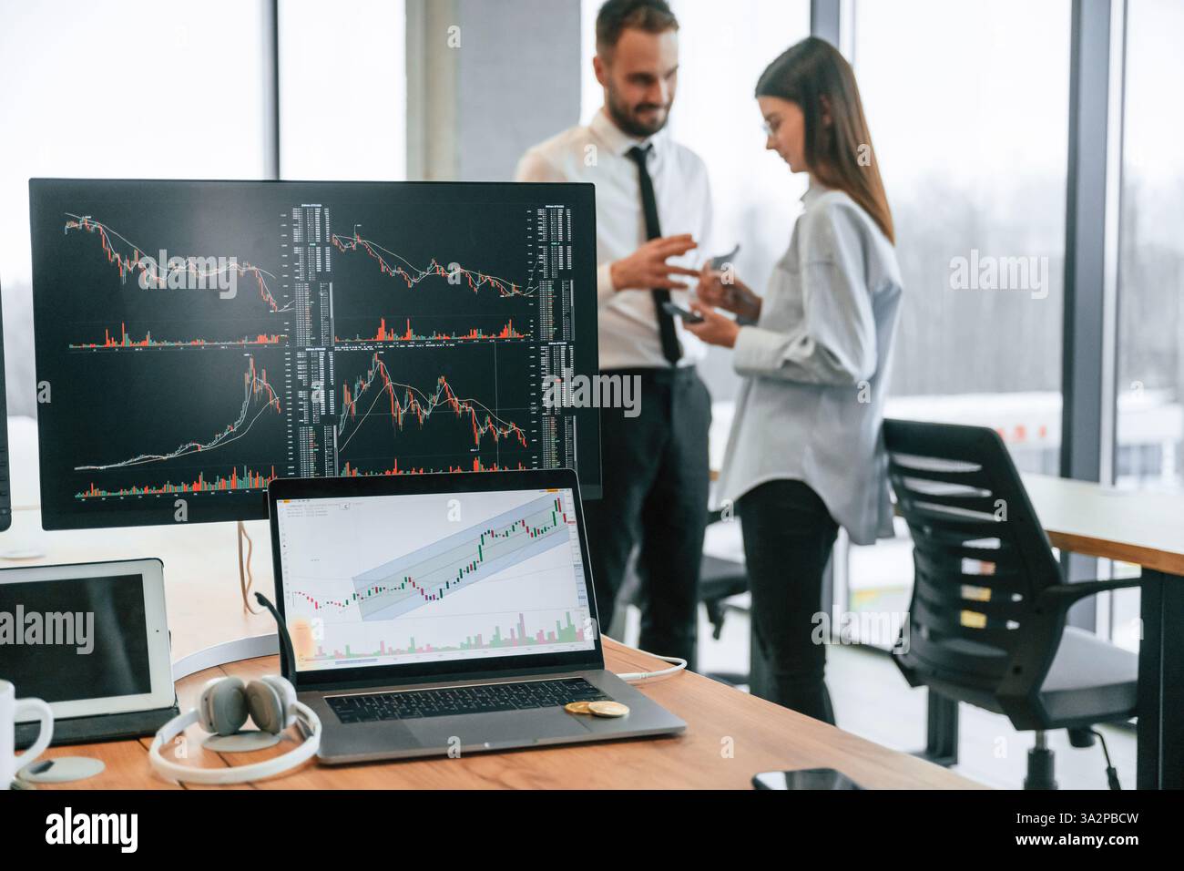 Two employees are working in the office together Stock Photo - Alamy