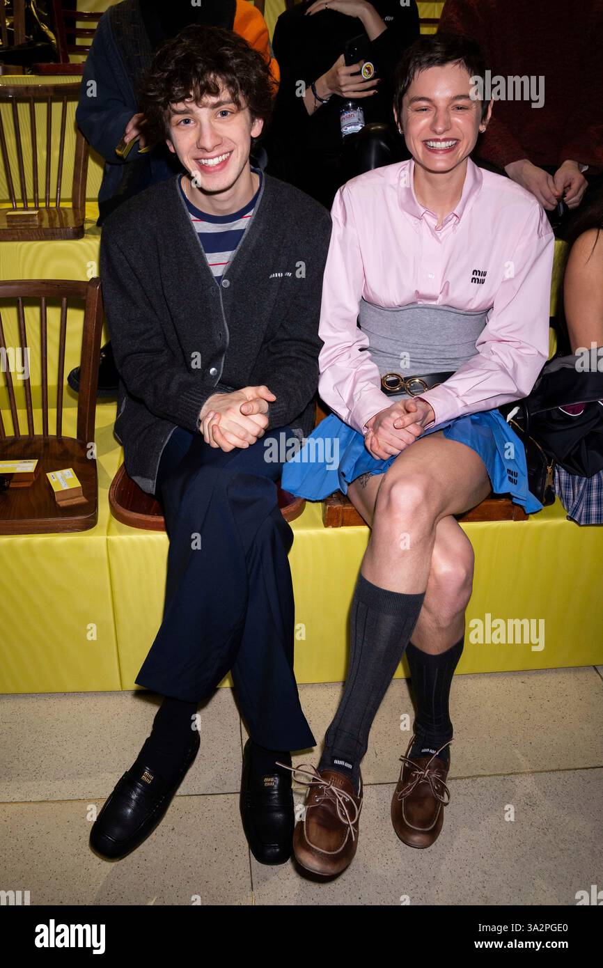 Mark Eydelshteyn, left, and Emma Corrin attend the Miu Miu Fall/Winter ...