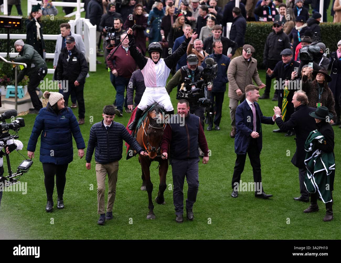 Bob Olinger and jockey Rachael Blackmore after winning the Paddy Power ...