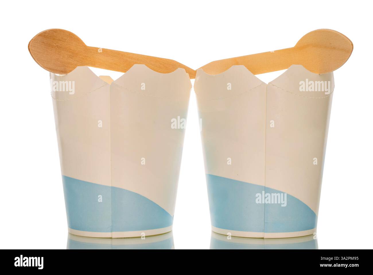 Two paper ice cream cups with wooden spoons, macro, isolated on white background Stock Photo - Alamy