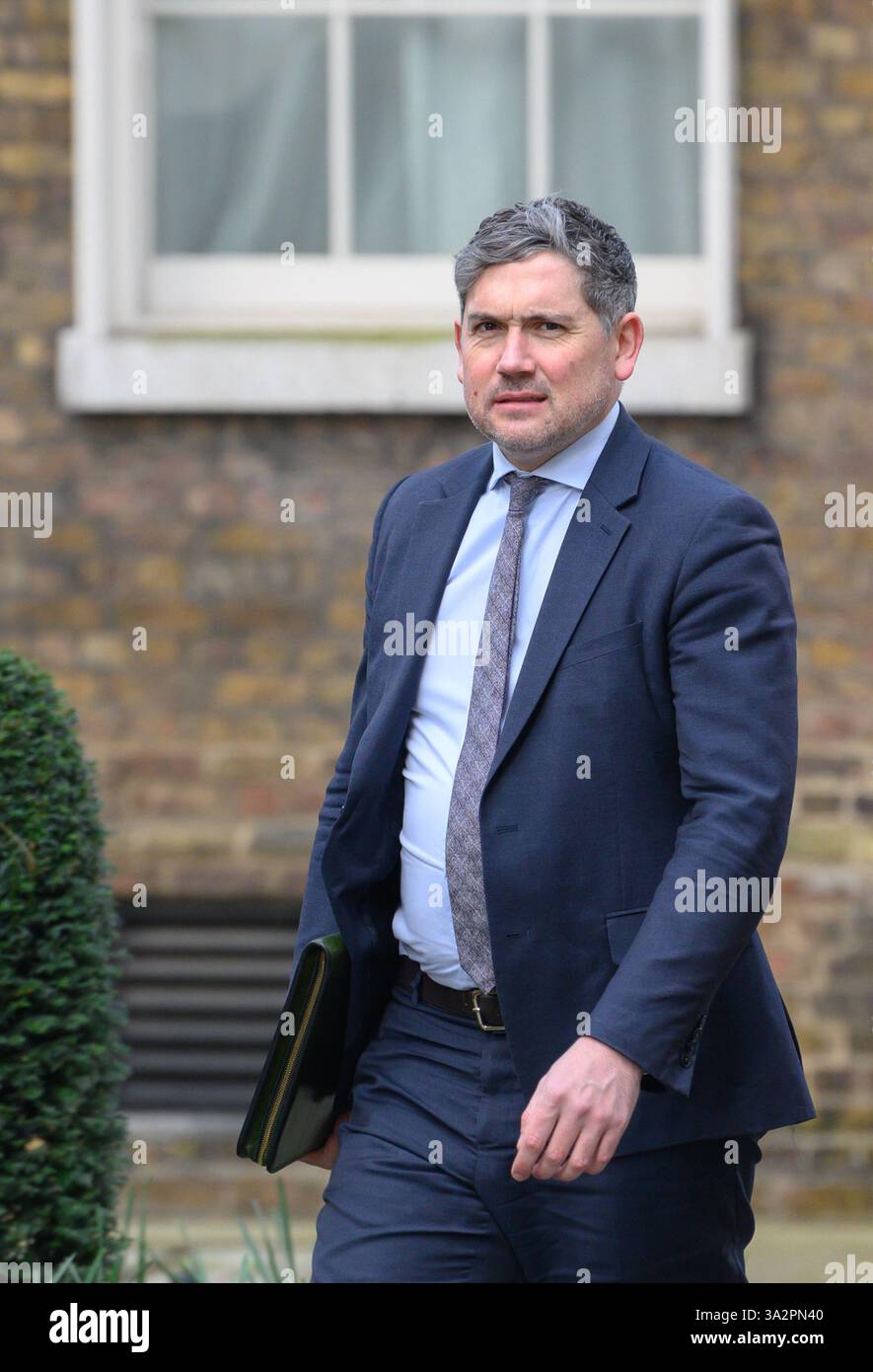 Luke Murphy MP (Lab: Basingstoke) in Downing Street for a meeting about impending cuts in the ...
