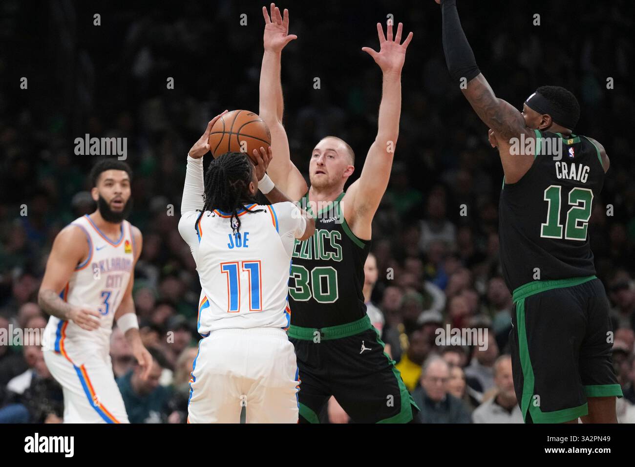 Boston Celtics forward Sam Hauser (30) defends during an NBA basketball ...