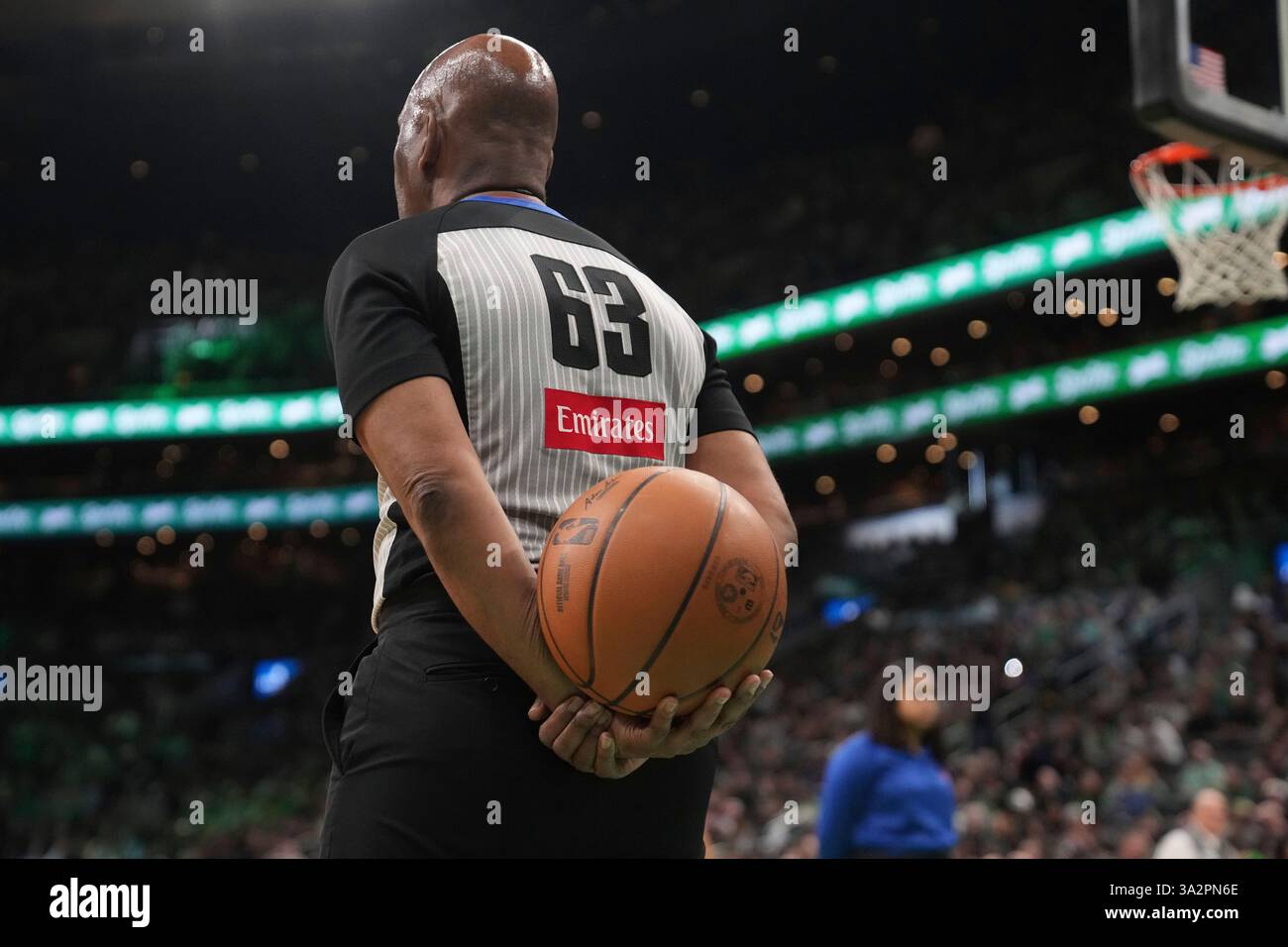 NBA referee Derek Richardson (63) waits for play to resume during an ...