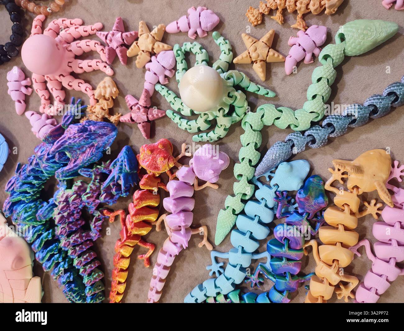 Creative multicolored models printed on 3D printer from molten plastic ...