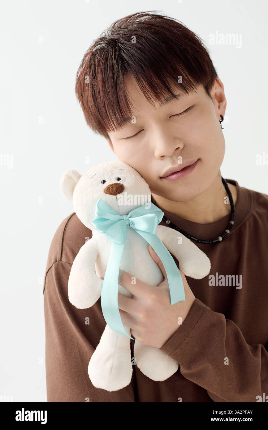 Young asian man lovingly hi-res stock photography and images - Alamy