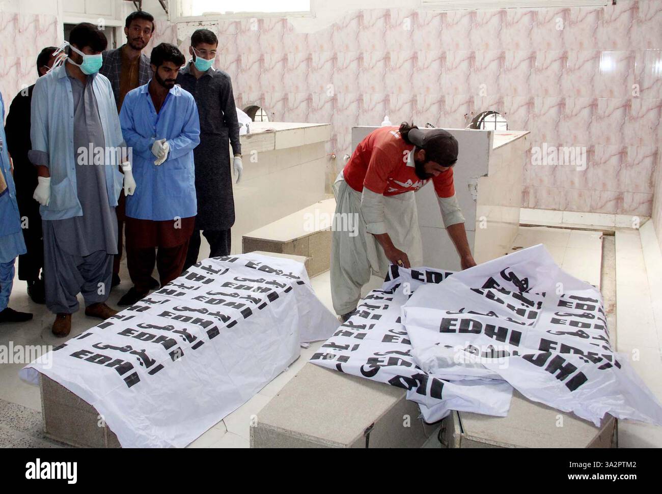 Bodies of victims of deadly train attack arrive at Civil Hospital in ...