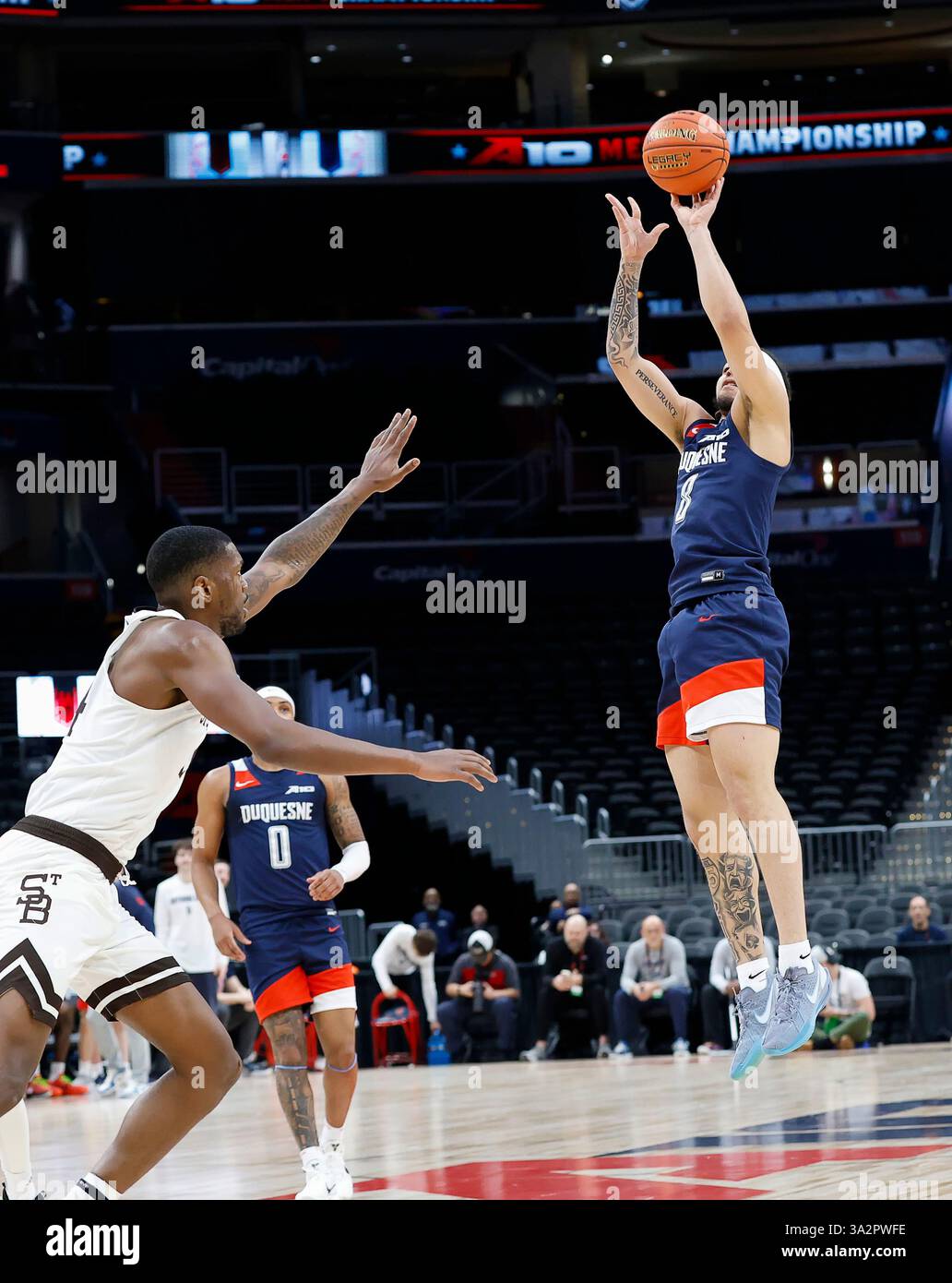 March 13, 2025: Duquesne Dukes Guard (8) Maximus Edwards takes a three ...