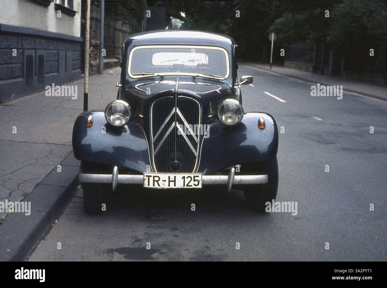 1960s, historical, a French car, a Citroen Traction Avant, parked ...