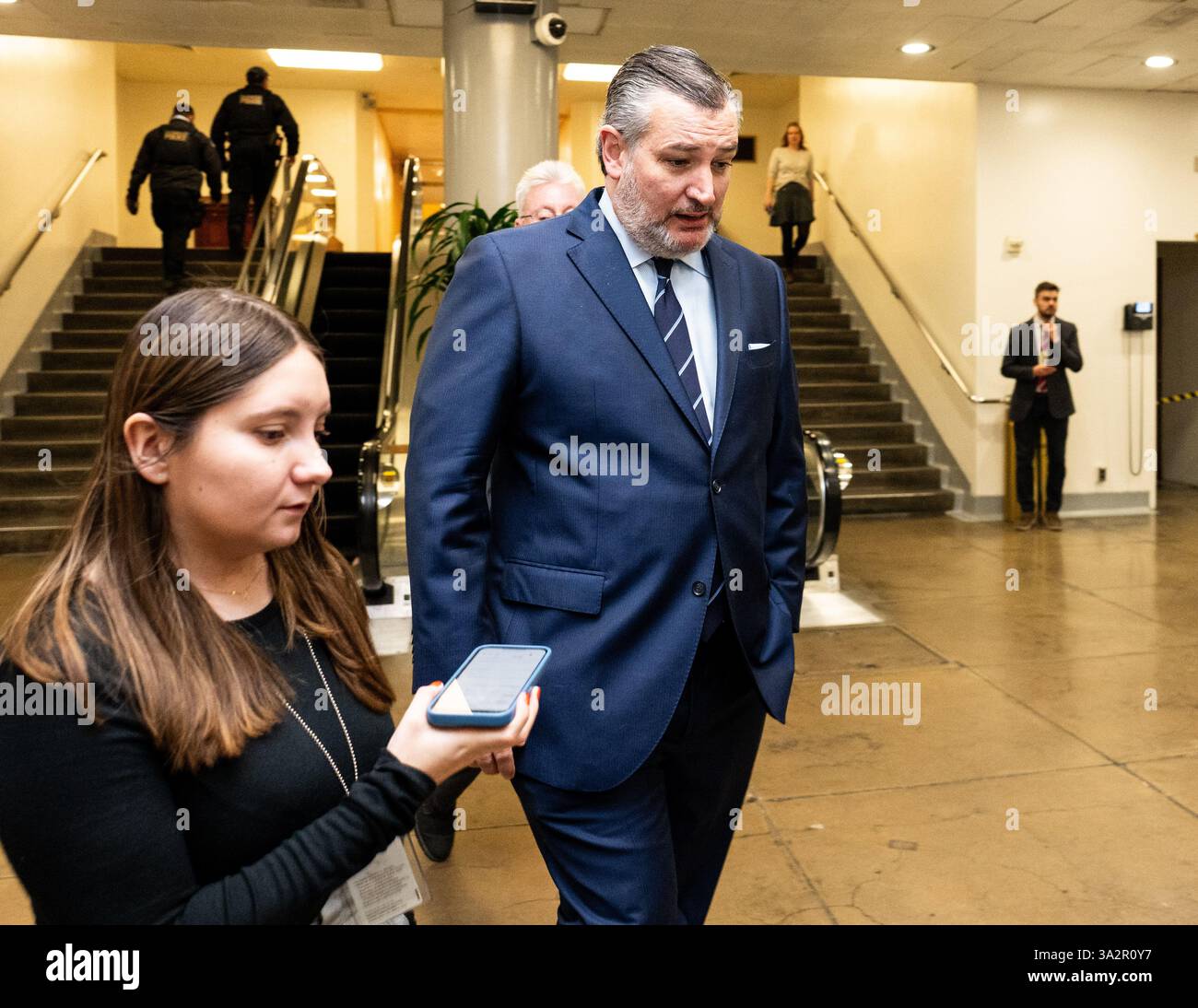 U.S. Senator Ted Cruz (R-TX) talking with a reporter near the Senate ...