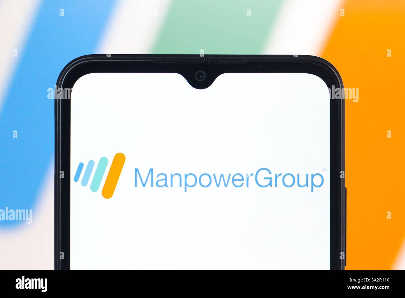 In this photo illustration, the ManpowerGroup logo is seen displayed on ...