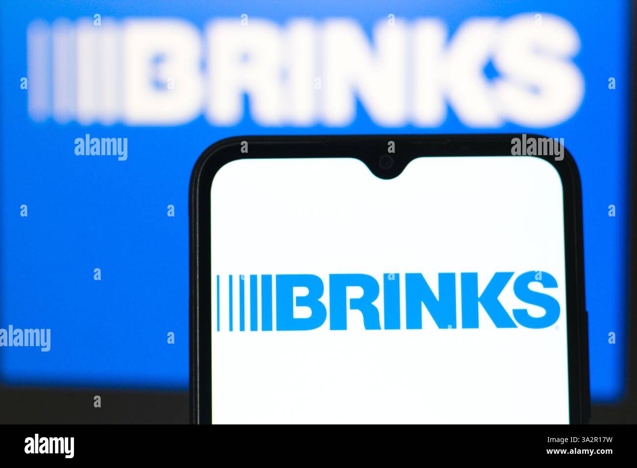 In this photo illustration, the Brink's Company logo is seen displayed ...