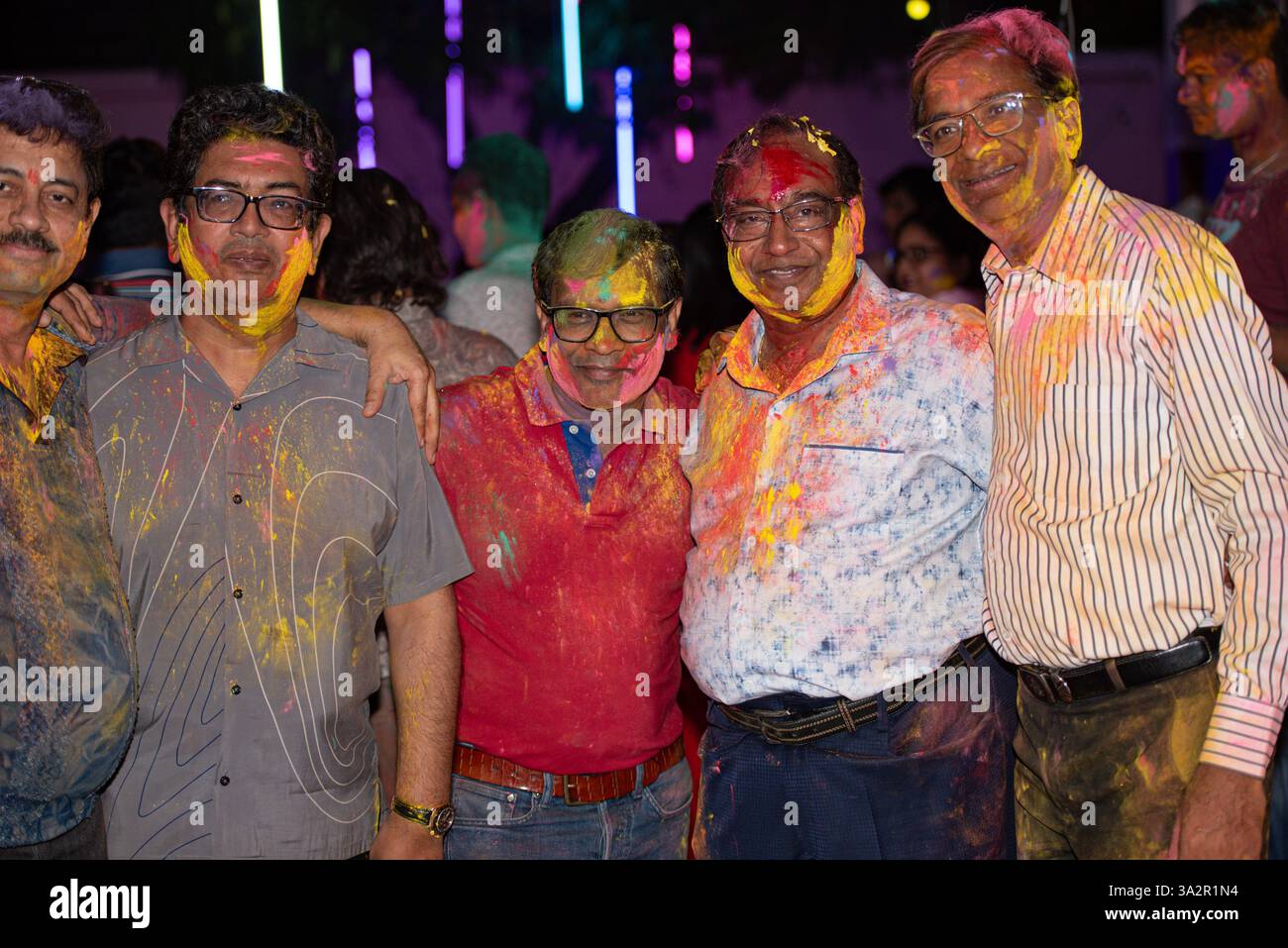 Bangkok, Thailand. 13th Mar, 2025. People dance and throw brightly ...