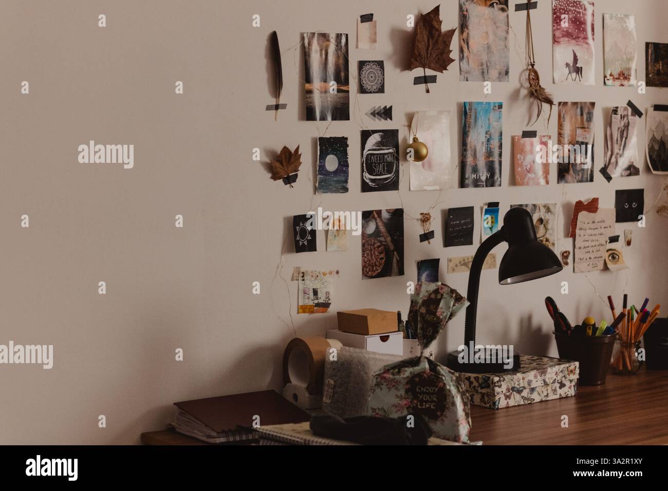 Creative Workspace with Wall Collage Stock Photo - Alamy