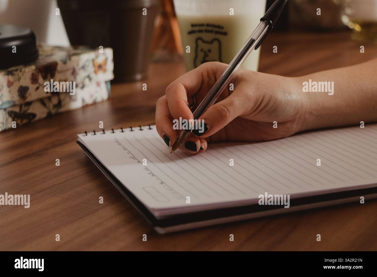 Closeup woman writing in notebook hi-res stock photography and images ...