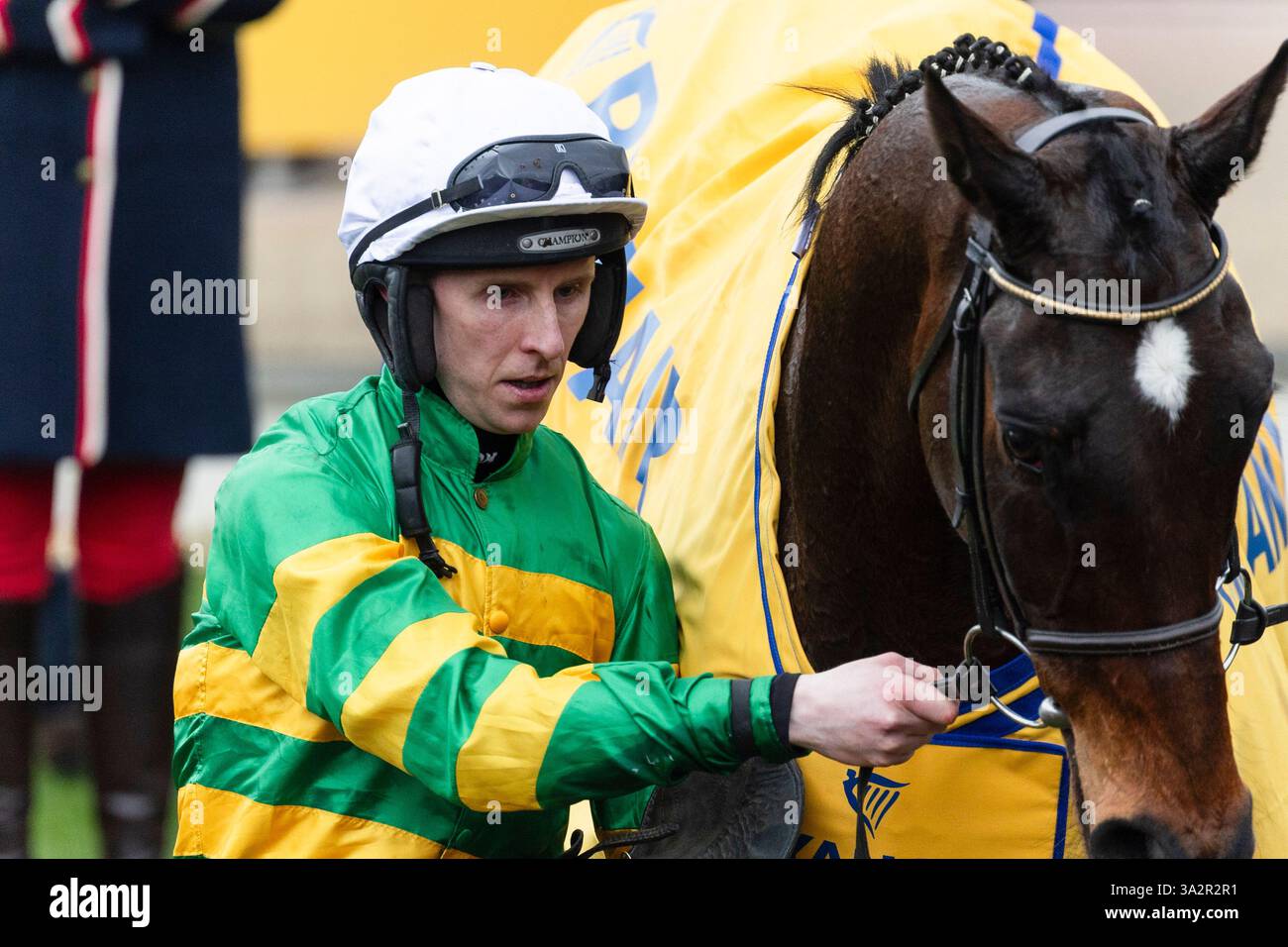 Cheltenham, England. March 13, 2025: Jockey, Mark Walsh on Fact to File ...