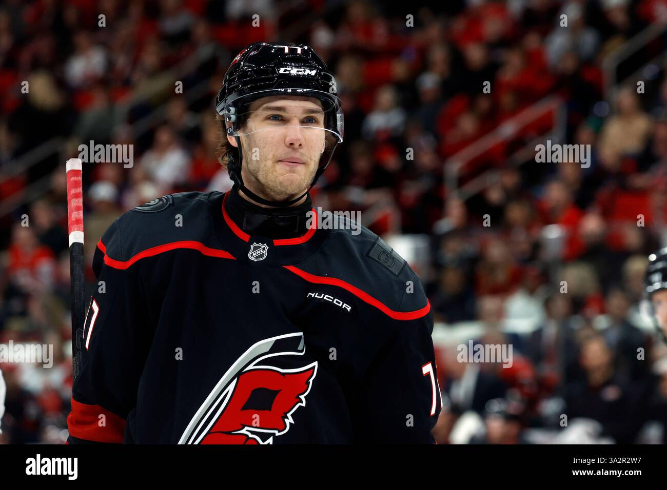 Carolina Hurricanes' Mark Jankowski (77) skates back to the face-off ...