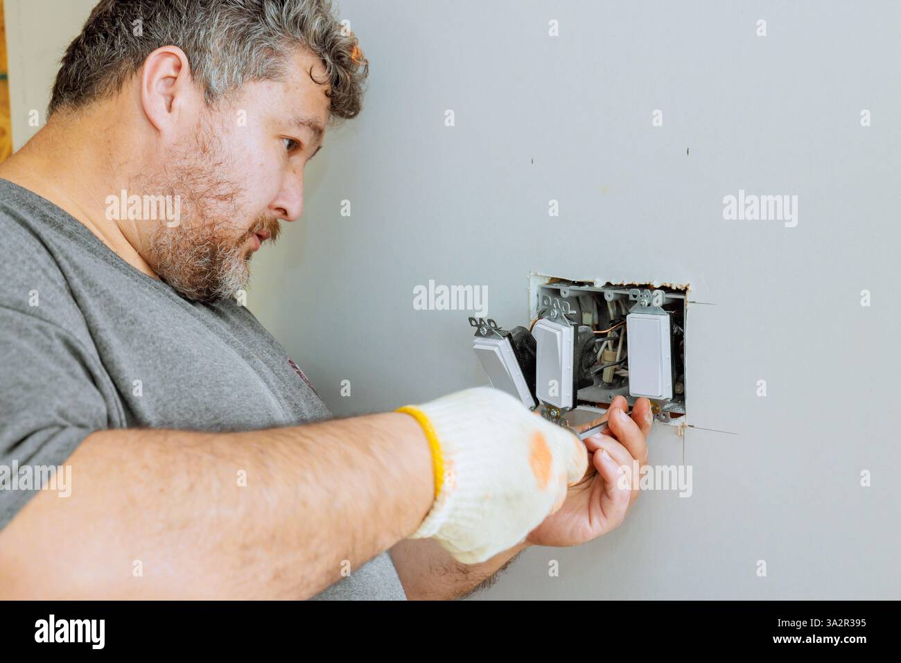 Electrician repairs home switches hi-res stock photography and images ...