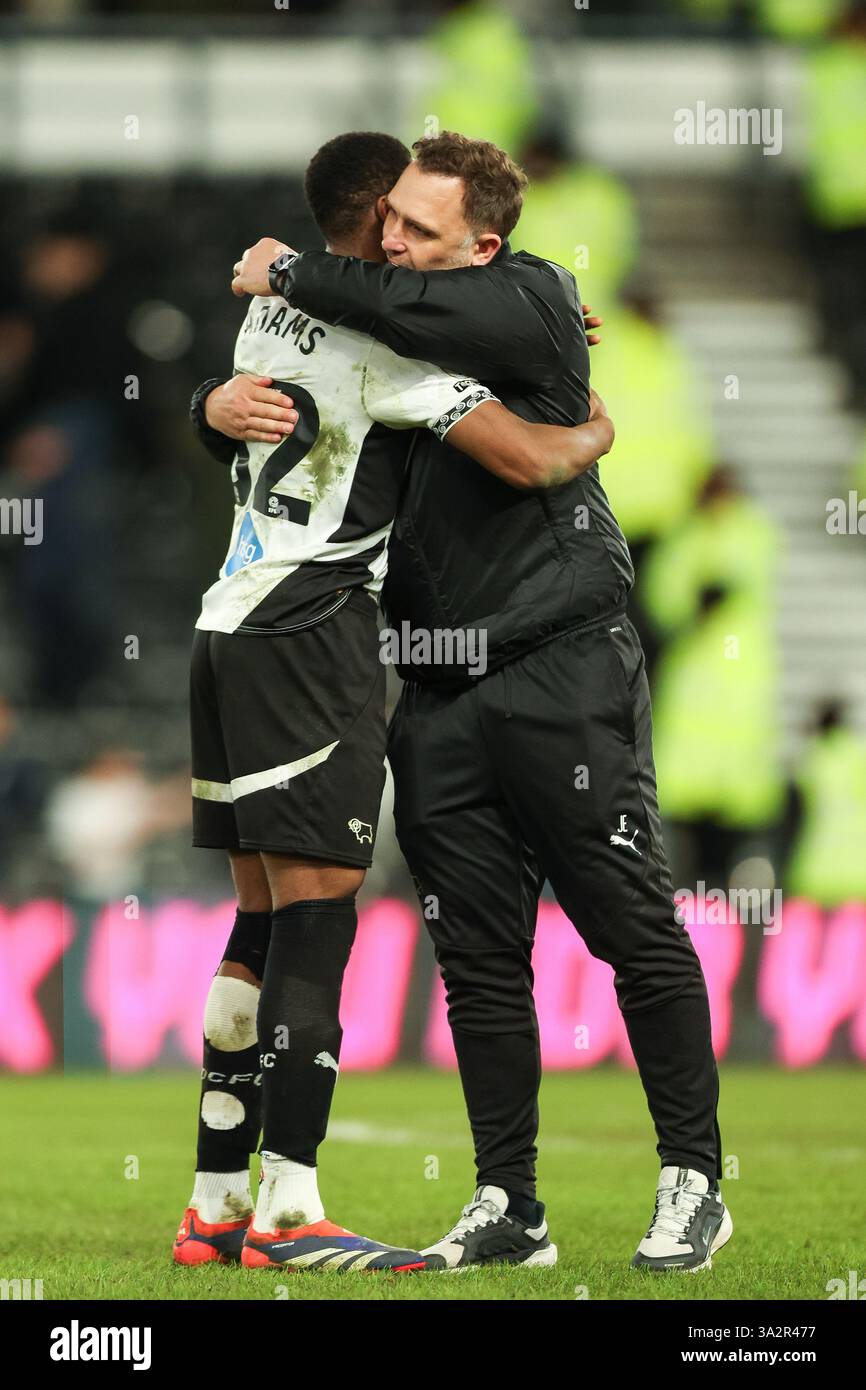 Derby County manager John Eustace and Derby County's Ebou Adams after ...