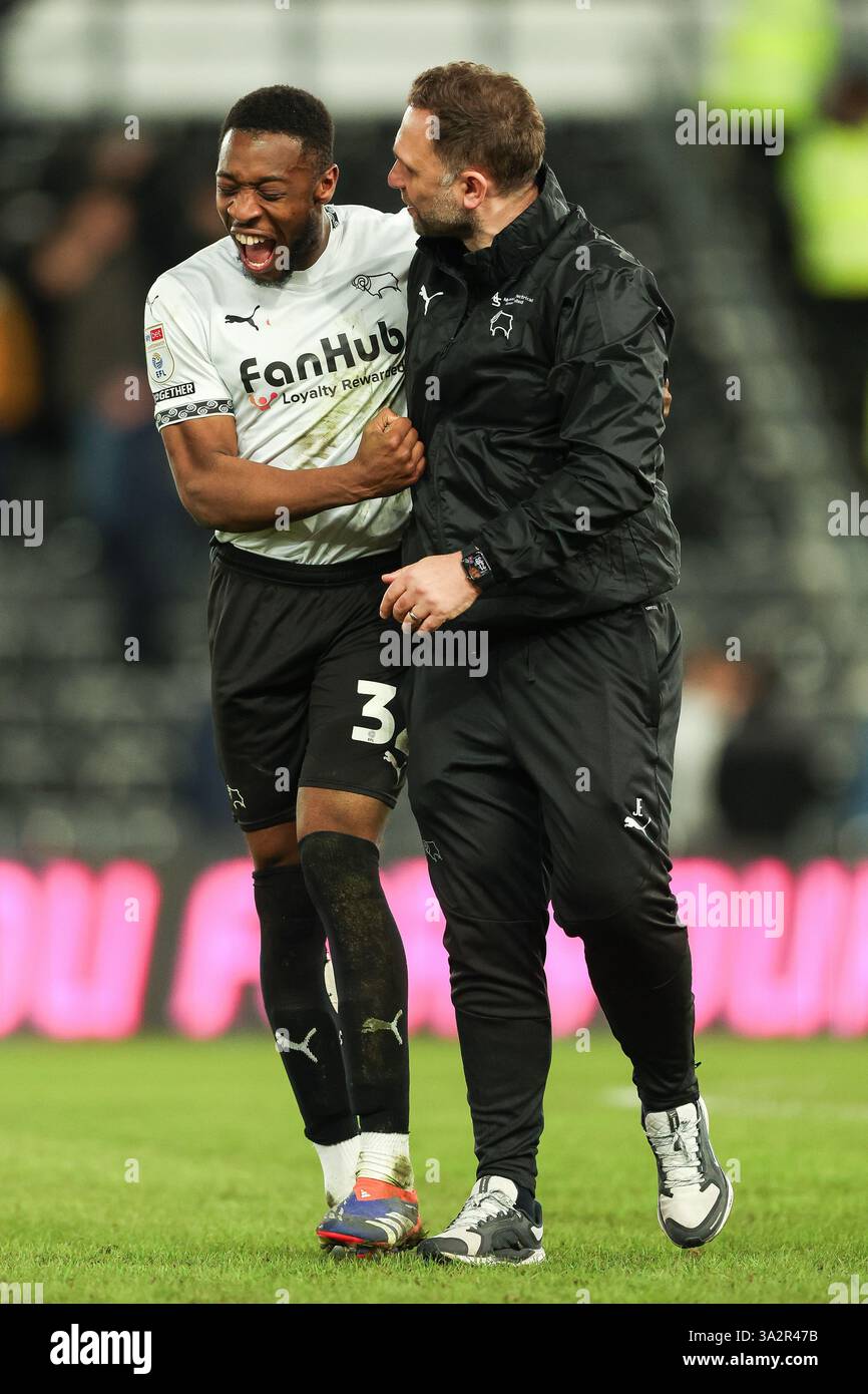 Derby County manager John Eustace and Derby County's Ebou Adams after ...