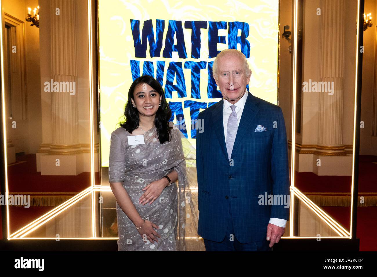 King Charles III poses for a photo with WaterWomen's Samia Anwar Rafa ...
