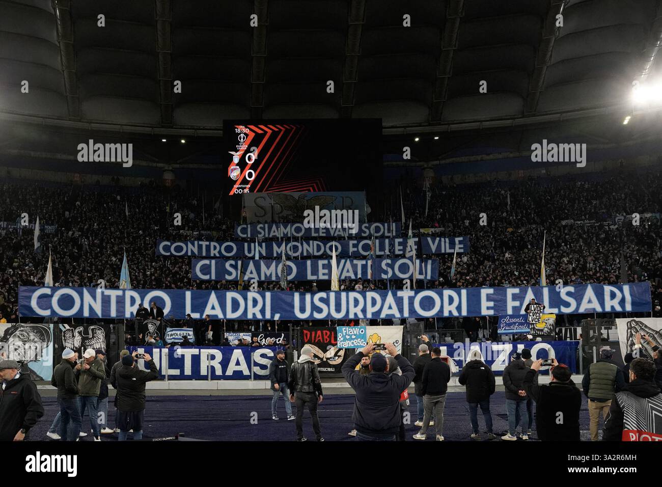 Rome, Italy. 13th Mar, 2025. Curva Nord Lazio fans scenography during ...