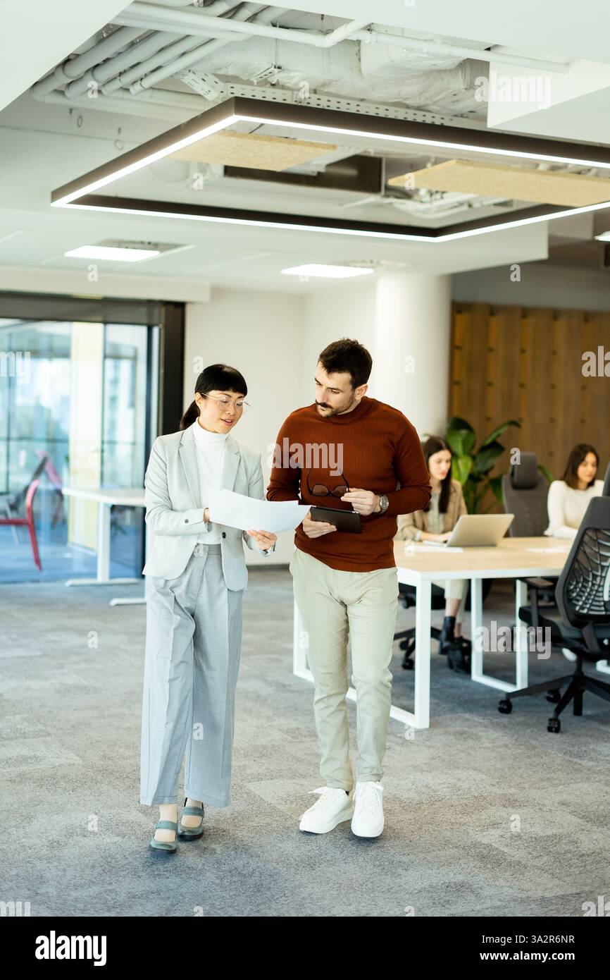 Colleagues engage in brainstorming hi-res stock photography and images ...