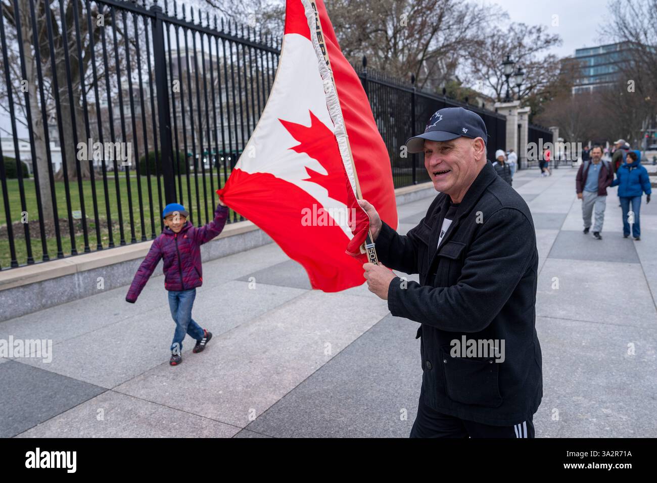 Toronto residents Douglas Bloomfield, right, and his son Phoenix, who ...
