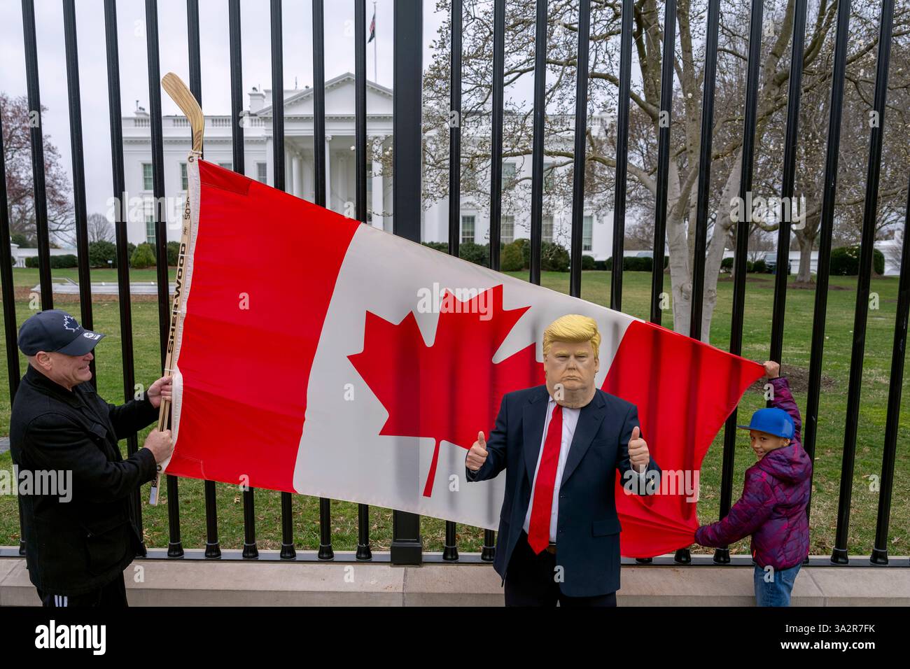 Toronto residents Douglas Bloomfield, from right, and his son Phoenix ...