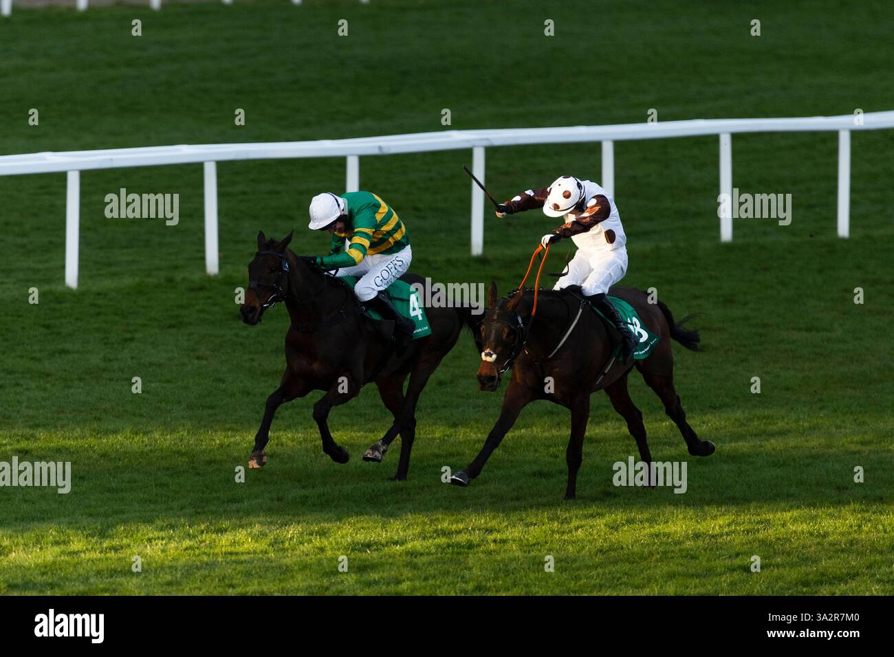 Cheltenham, England. March 13, 2025: (L-R) Jockey's Derek O'Connor (4 ...