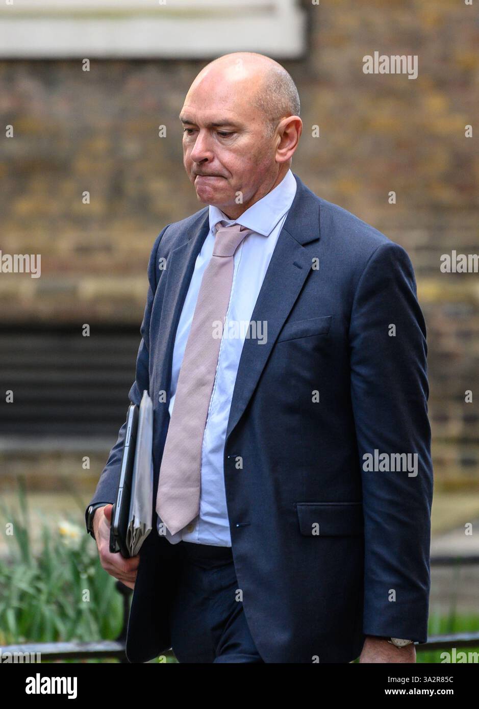 Sir James Mackey - interim CEO of NHS England - entering Downing Street ...