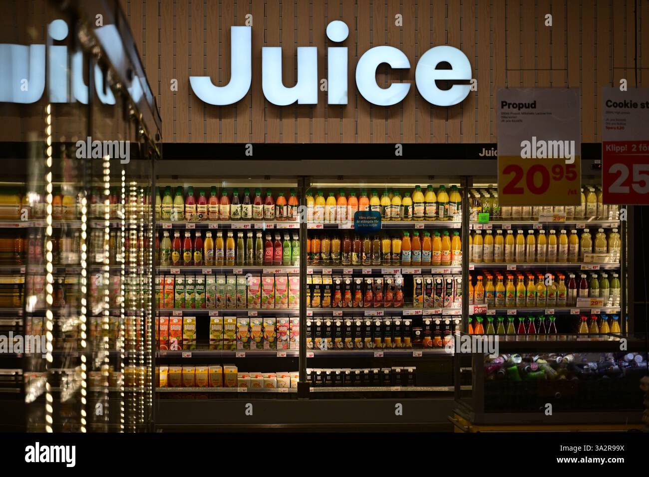 Kristianstad, Skåne, Sweden. March 13 2025. Inside the grocery store City Gross. Juice aisle ...